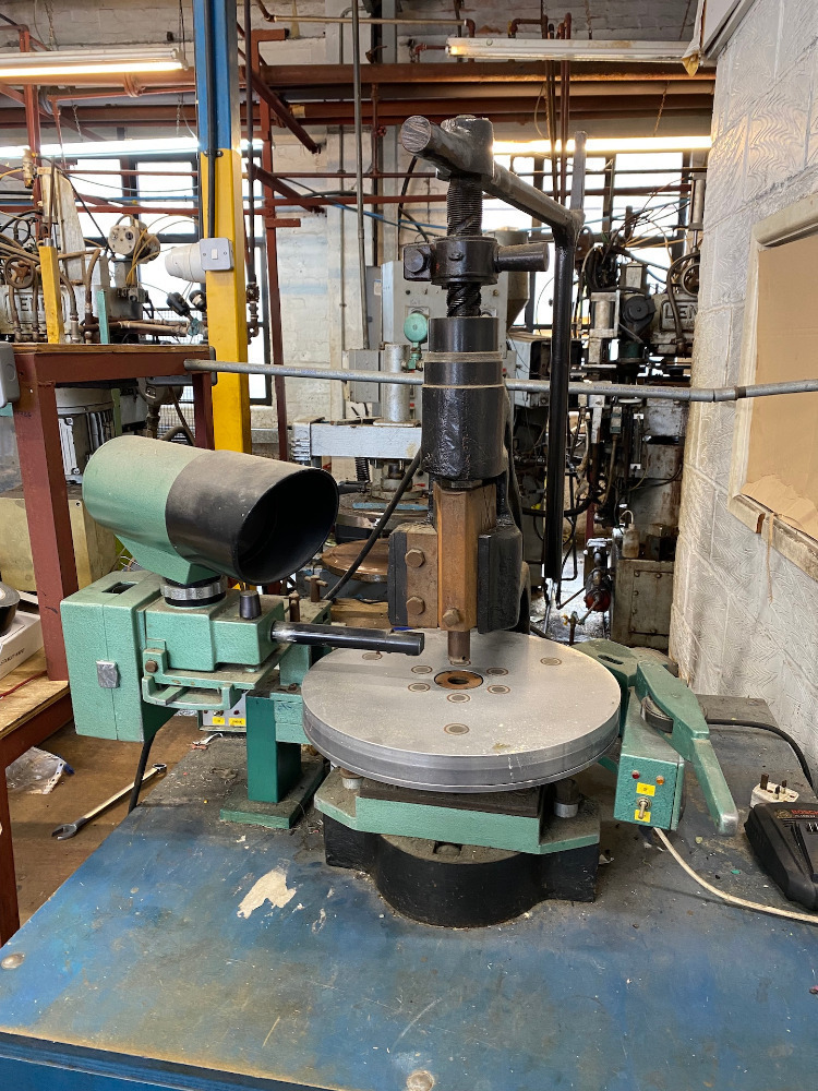 Norton Fly Press with Motorised Rotary Disc Aligner on Metal Bench.